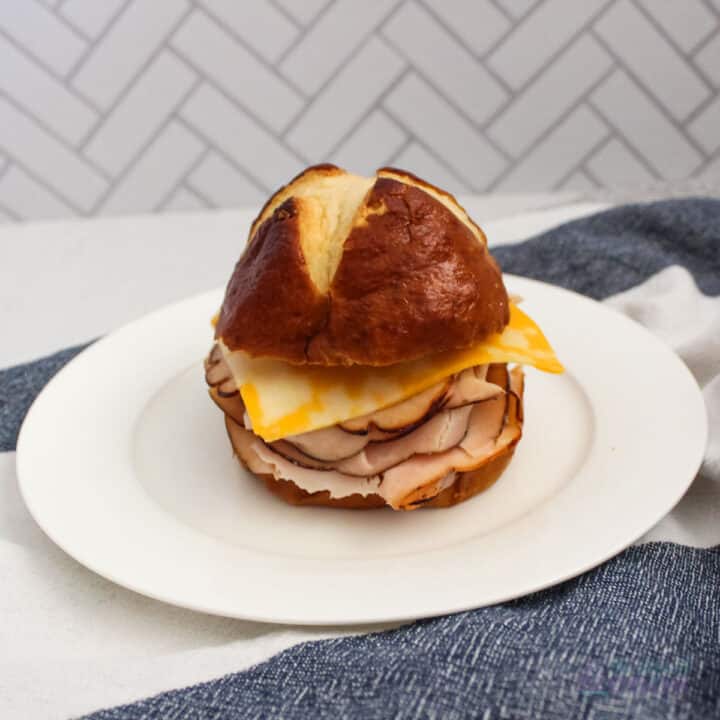 Pretzel Bun Sandwich with Deli Turkey and Cheese - The Default Cook