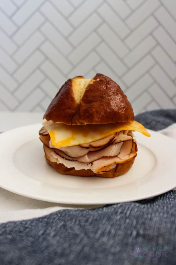Pretzel Bun Sandwich with Deli Turkey and Cheese - The Default Cook